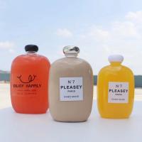 China 250ml 350ml 500ml PET Plastic Juice Bottle Custom Logo Beverage Container for sale