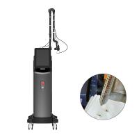 China 7 Joint Arm Stretch Removal Fractional CO2 Laser Machine With 0.1ms-10ms Pulse for sale