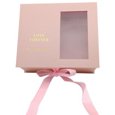 China Hot Foil Flower Gift Box with Magnetic Closure & Ribbon - A4 Rigid Packaging for Cosmetics & Jewelry for sale
