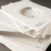 China Custom Luxury Garment Swing Tags 200-600gsm Paper Plastic Hang Tags With String For Clothing Branding for sale