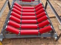 China Galvanized Steel Frame Red Conveyor Idler Roller Roller Suitable For Mining Material Handling for sale