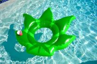 China Custom Green Leaf Inflatable Swimming Float 64x64 Inch 0.25mm PVC Pool Party for sale