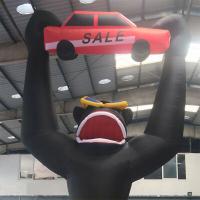 China outdoor inflatable advertising gorillas holding a car models for sale
