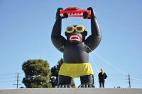 China outdoor inflatable advertising gorillas holding a car models for sale