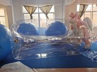 China custom inflatable fetish transparent  PVC inflatable rolling tube inflatable stress bag for sale