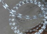 China Green Pvc Coated Galvanized Coils Of Barbed Wire For Security Fence for sale