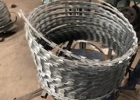 China 10m Hot Dipped Galvanized Razor Barbed Wire BTO 22 Solid Easy Installation for sale