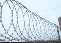 China 900mm 0.6mm Razor Barbed Wire 15m/Coil High Tensile Fence Prevent Corrosion for sale