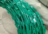 China PVC Sprayed Razor Barbed Wire CBT65 Army Border Electro Galvanized Coiled for sale