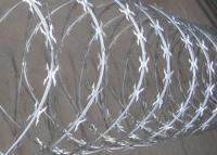 China 16m 0.35mm Barbed Wire Concertina Coil ISO 9001 Razor Electric Fence for sale