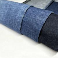 China High Elastic Shrink Resistant Dark Indigo Slub Denim Fabric For Jeans 7.3 Oz for sale