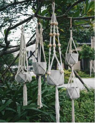 China Eco Friendly Cotton Macrame Plant Hanger 52 Inch Natural Jute Rope Indoor Hanging Planter for sale