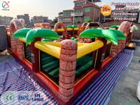 China Best PVC Palm Tropical Forests Big Inflatable Bounce House Slide Fun City for sale