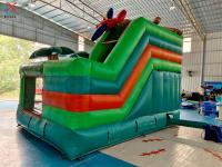 China PVC Jungle Adventure Inflatable Bounce House With Slide Rainforest Monkey Palm Tree Design Kids Party for sale