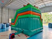 China PVC Jungle Adventure Inflatable Bounce House With Slide Rainforest Monkey Palm Tree Design Kids Party for sale