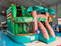 China PVC Jungle Adventure Inflatable Bounce House With Slide Rainforest Monkey Palm Tree Design Kids Party for sale