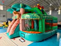China PVC Jungle Adventure Inflatable Bounce House With Slide Rainforest Monkey Palm Tree Design Kids Party for sale