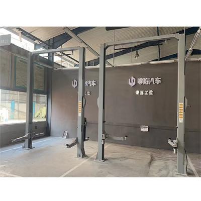 China T240M-1 Heavy Duty 2 Post Auto Lift With Safety Locks And Angled Lifting Arms for sale