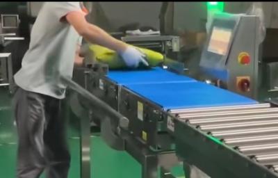 China SUS304 Rolling Conveyor Check Weigher With Tilting Rejection Device for sale