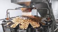 China Stand Up Pouch Vertical Weighing Packing Machine 2.5kg Peanut Cashew Nuts Packaging Machine for sale