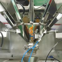 China High Quality Vertical Automatic Quantitative Particle Snack Food Sealing Filling Packing VFFS Weighing and Packaging Machine for sale