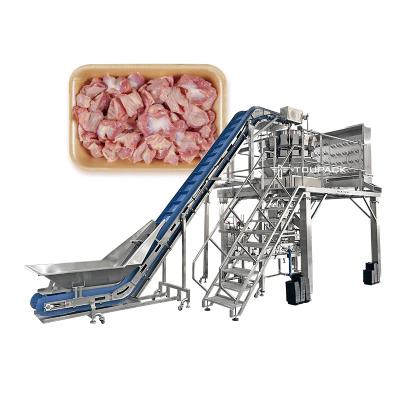 China Frozen Products Screw Feeding Multihead Weigher Automatic Tray Packaging Line for sale
