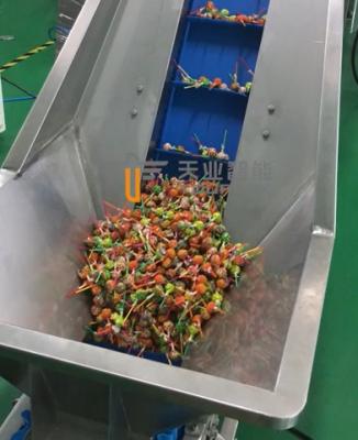 China 25WPM Slot Conveyor Multihead Weigher Packing Machine Lollipop Candy Packaging System for sale