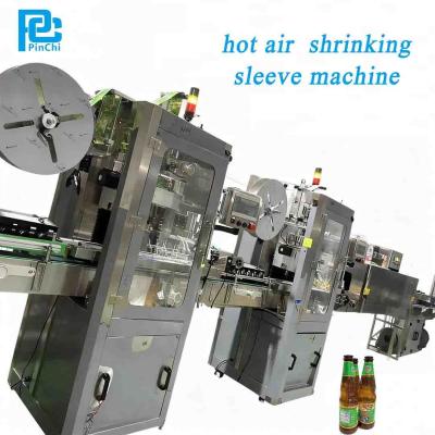 China Automatic Hot Shrinking Sleeves Machine 2 Shooting Station Hollow-Blow Furnace Bottle Labeling for sale