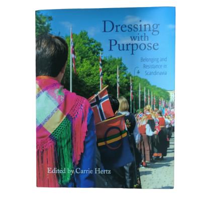 China Dressing With Purpose | Hardcover Art Book Printing Matte Finish Smyth Sewn Jacket Included Glossy Art Paper Inner Pages for sale
