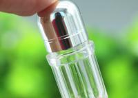 China Cylinder 11mm Capsule Packaging Bottles With Metal Cap for sale