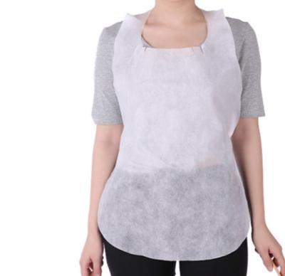 China Custom Waterproof Oil-Proof Splash-Proof Apron PP Nonwoven Disposable Apron Bibs For Restaurant for sale