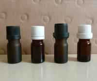 China 5ml Amber Frosted Glass Essential Oil Bottle with Plastic Cap Dark Glass Vial for sale