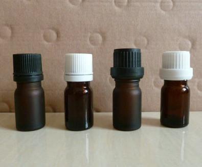 China 5ml Amber Frosted Glass Essential Oil Bottle with Plastic Cap Dark Glass Vial for sale
