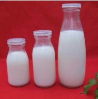 China Food Grade Glass Milk Juice Bottles 100ml 200ml 250ml 500ml with PE Cap for sale