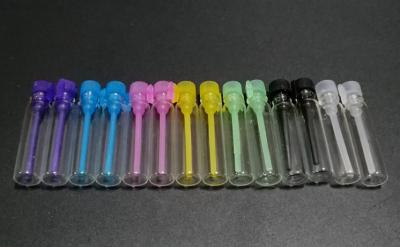 China Wholesale 0.5ml 3ml Glass Perfume Sample Vials Clear Drawn Tube Bottles with Color Plastic Plugs for sale