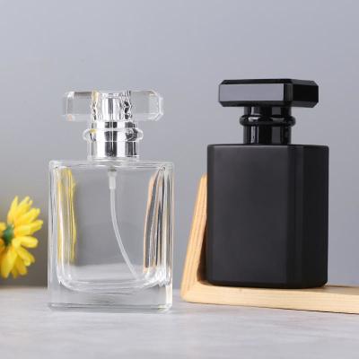 China 30ml 50ml Flat Square Glass Perfume Dispenser Bottle Empty Cosmetic Spray Bottle for sale
