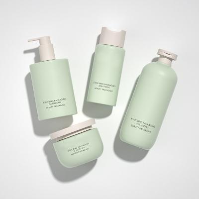 China Custom PET Cosmetic Packaging Set 250ml 500ml Lotion Shampoo Bottle with Dispenser Pump Eco Friendly for sale