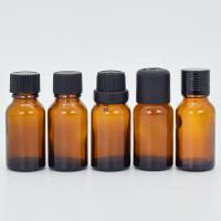 China Glass Dropper Bottles designed for cosmetic packaging with multiple sealing caps and compatible glass dropper assemblies for sale