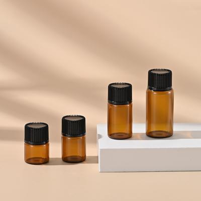 China Wholesale 1ml 1.5ml 2ml 3ml 5ml Amber & Clear Glass Sample Vials, Mini Essential Oil Trial Bottles with Colorful Ribbed Plastic Caps for sale