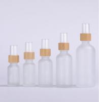 China Frosted Glass Bamboo Spray Bottle 5ml to 100ml Essential Oil Perfume Packaging for sale