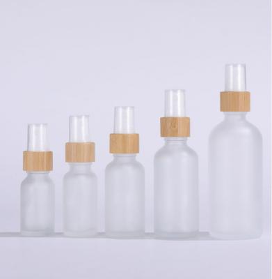 China Frosted Glass Bamboo Spray Bottle 5ml to 100ml Essential Oil Perfume Packaging for sale