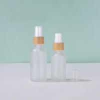 China Frosted Glass Bamboo Spray Bottle 5ml to 100ml Essential Oil Perfume Packaging for sale