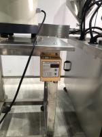 China SUS304 Automatic Eyeliner Filling Machine with 1500 Units/Hour Capacity and ±0.05ml Precision for 1-20ml Products for sale