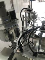 China SUS304 Automatic Eyeliner Filling Machine with 1500 Units/Hour Capacity and ±0.05ml Precision for 1-20ml Products for sale