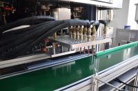 China 15-Color Cosmetics Filling Machine with 1200-1500pcs/Hour Capacity and ±0.1ml Precision for sale