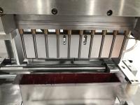 China SUS304 12-Hole Double Barrel Automatic Lipstick Filling Machine 1-15ml Capacity 320kg Industrial Grade for sale