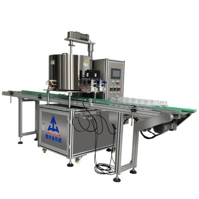 China 80L Double Head Gear Pump Heated Filling Machine for Creams and Oils | 5KW Power | 40-140 pcs/min Capacity for sale