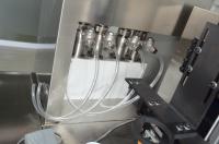 China Four Color Granular Balls Isolation Cream Filling Machine 1200×1200×1500mm with 50-250ml Capacity for Cosmetic Pattern Products for sale