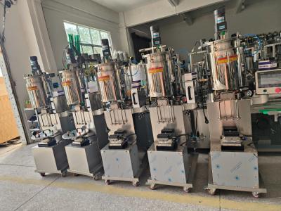 China Semi-automatic Mascara Lipgloss Filling Machine with Heating Mixing Function 1-20ml Capacity 1600-2400 pcs/hour for sale