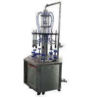 China Semi-automatic perfume rotary filling machine for sale